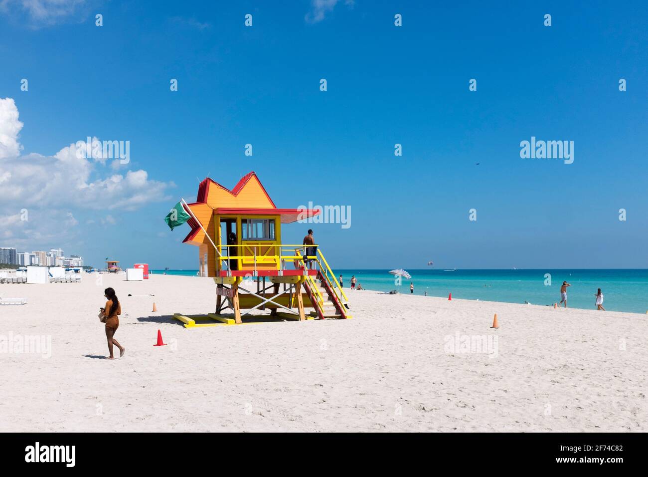 A lifeguard in his tower as perfect weather and crystal clear water ...