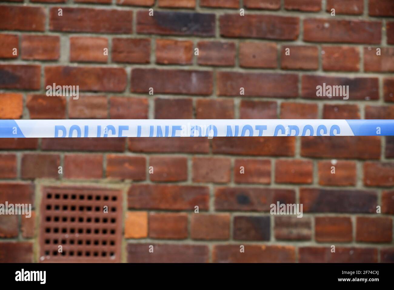 A police tape is seen at a crime scene in London Stock Photo - Alamy
