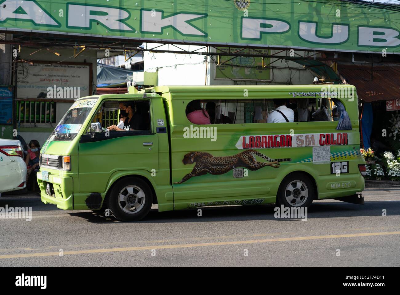 An improvised vehicle used for public transport in the Philippines ...
