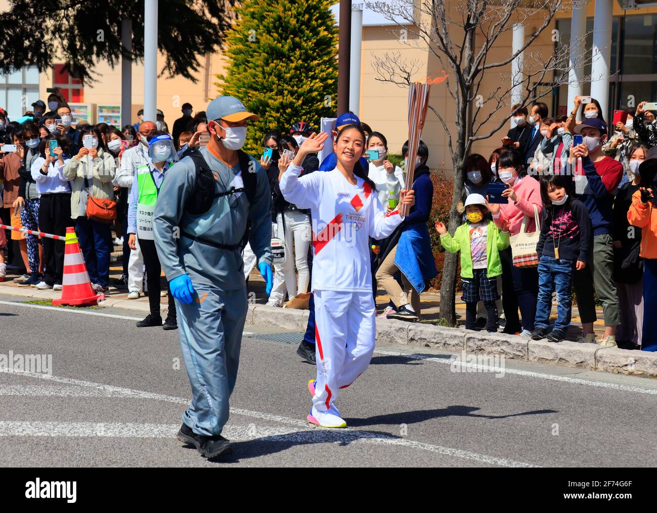 Local torchbearer, Eri Hayashi runs during the Tokyo 2020 Olympic torch ...