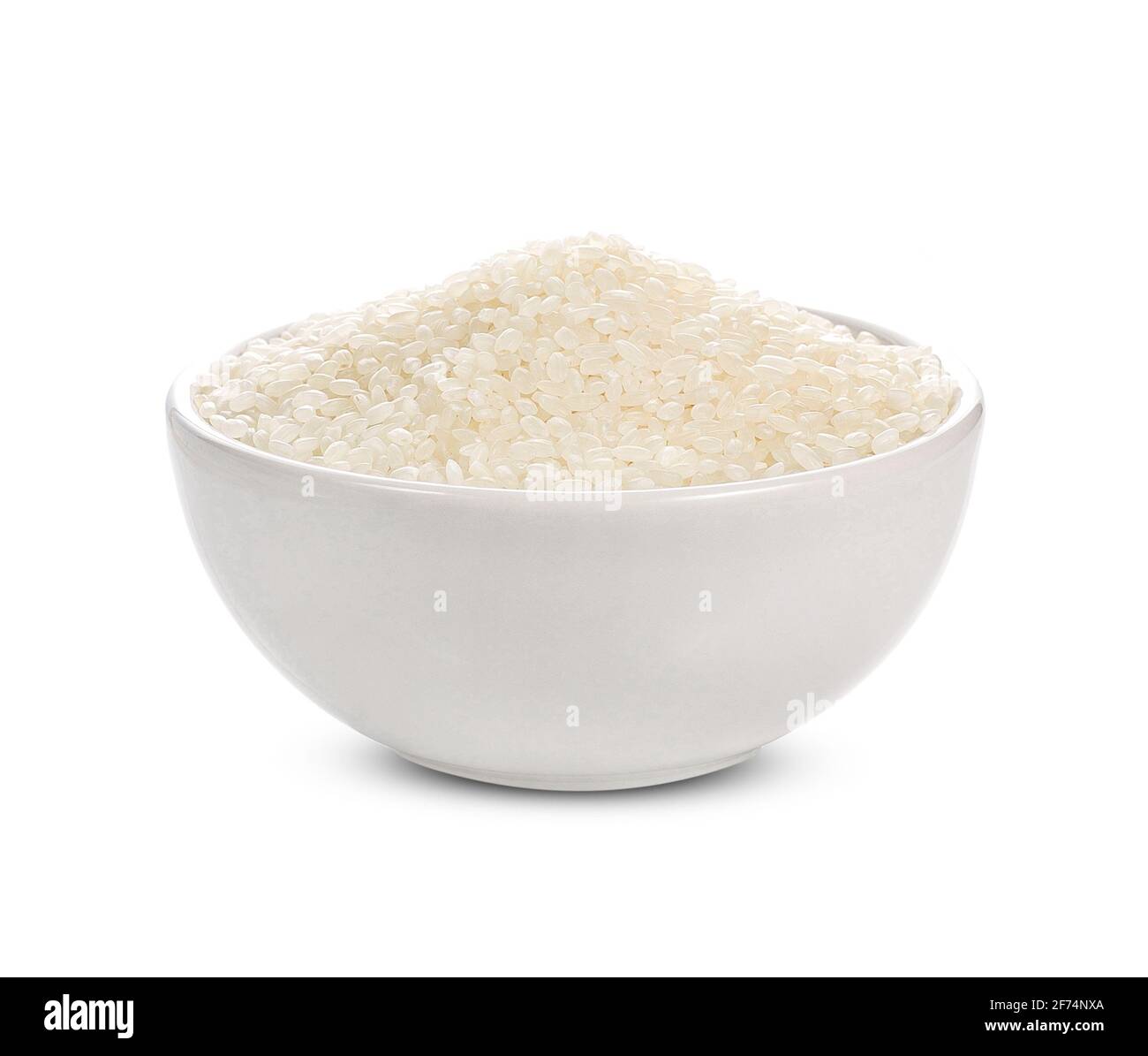 rice in a bowl isolated on white background Stock Photo - Alamy
