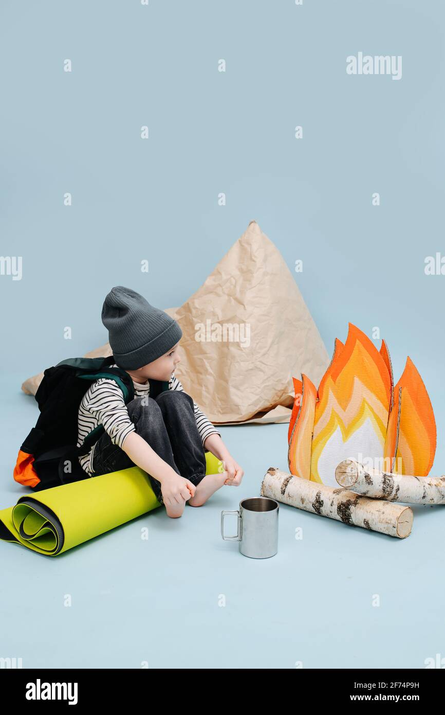 Boy packing backpack hi-res stock photography and images - Alamy