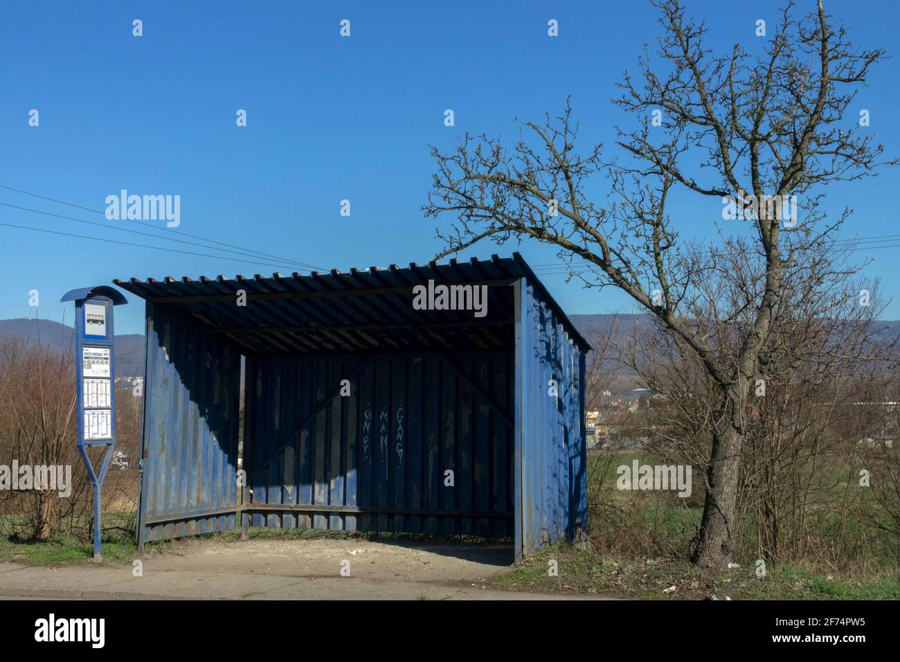 Bus station in blue, rural suburban small building Stock Photo - Alamy