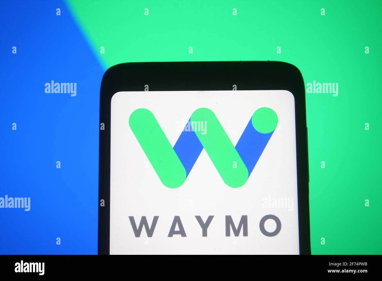 In this photo illustration the Waymo logo of an US autonomous driving ...