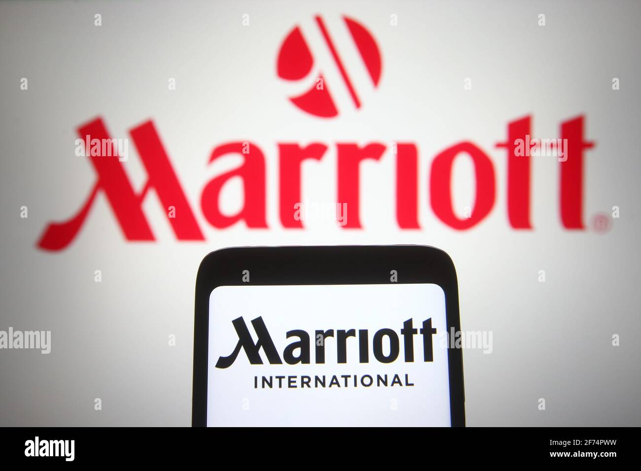 In this photo illustration the Marriott International logo is seen on a ...