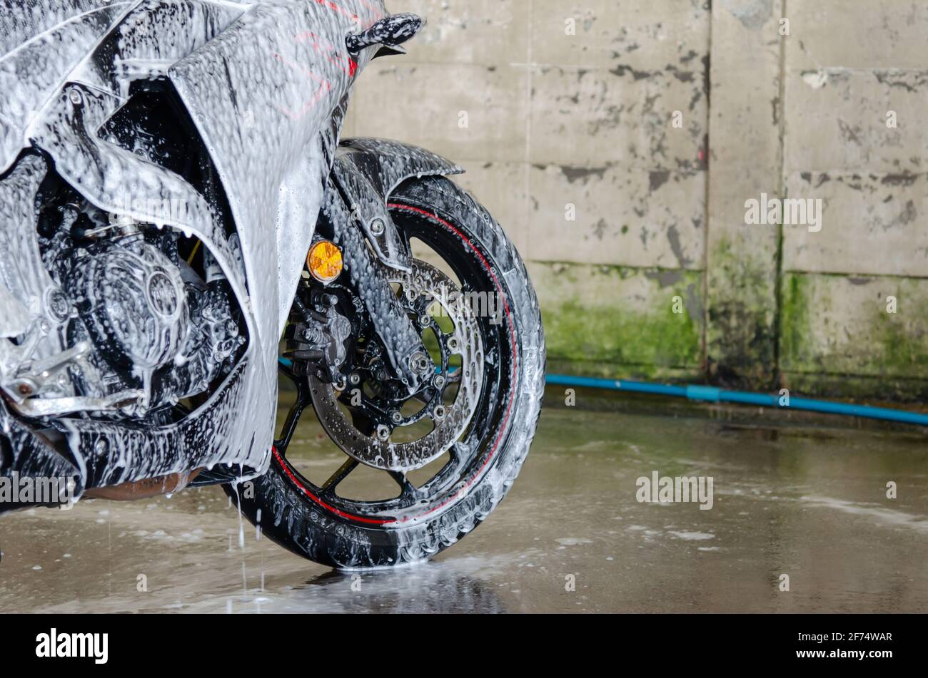 Washing motorcycle hi-res stock photography and images - Alamy