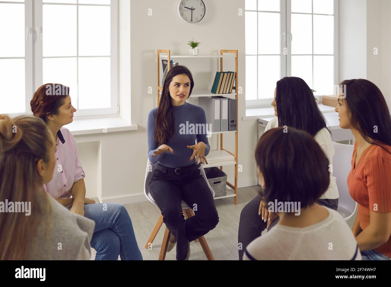Women helping each other hi-res stock photography and images - Alamy