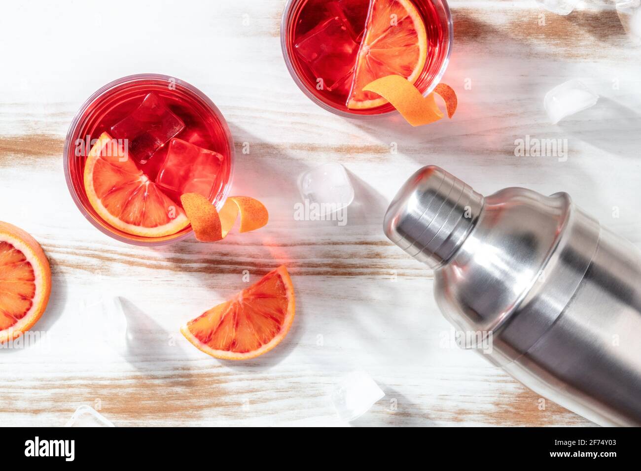 Orange cocktails with blood oranges and a shaker, shot from above Stock ...