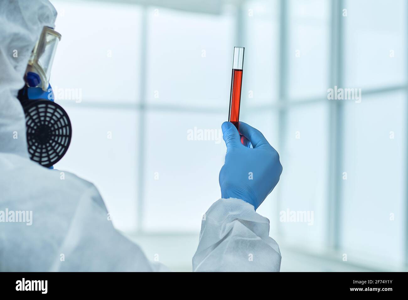Man holding test tube full view hi-res stock photography and images - Alamy