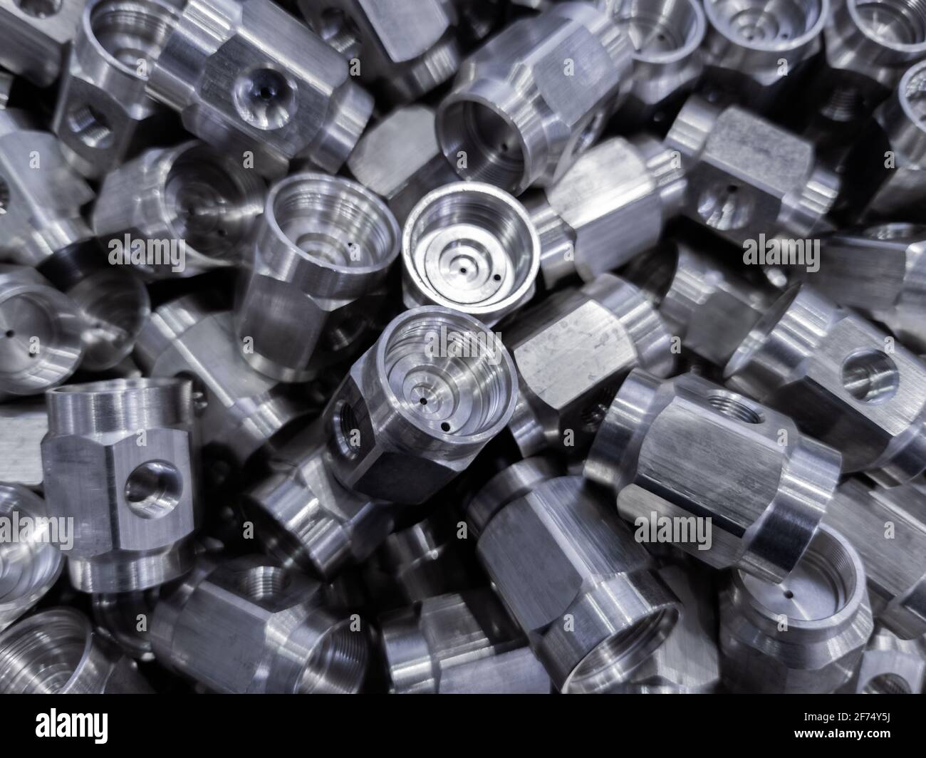 pile of abstract industrial close-up full frame background of shiny ...