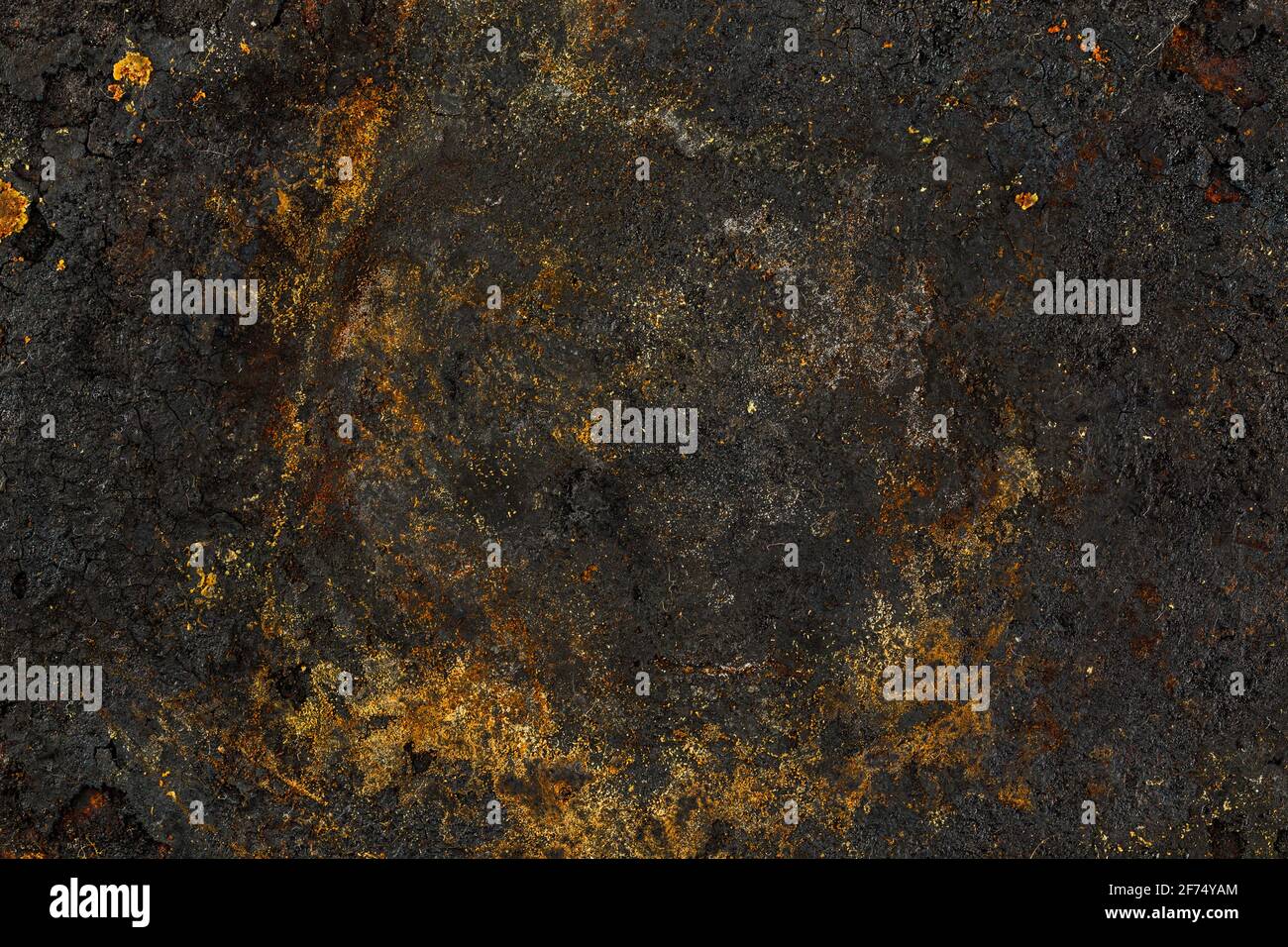Bottom side of a cast iron pan with thicl layer of soot on it Stock ...