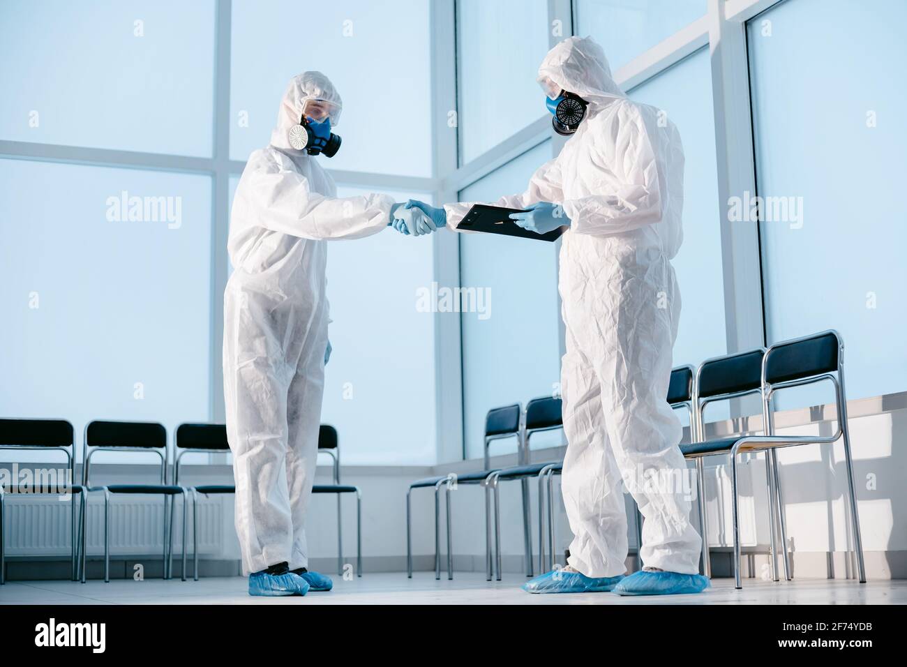 Personal protective suits hi-res stock photography and images - Alamy