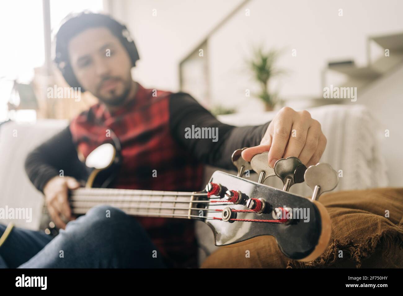 Tune guitar hi-res stock photography and images - Alamy