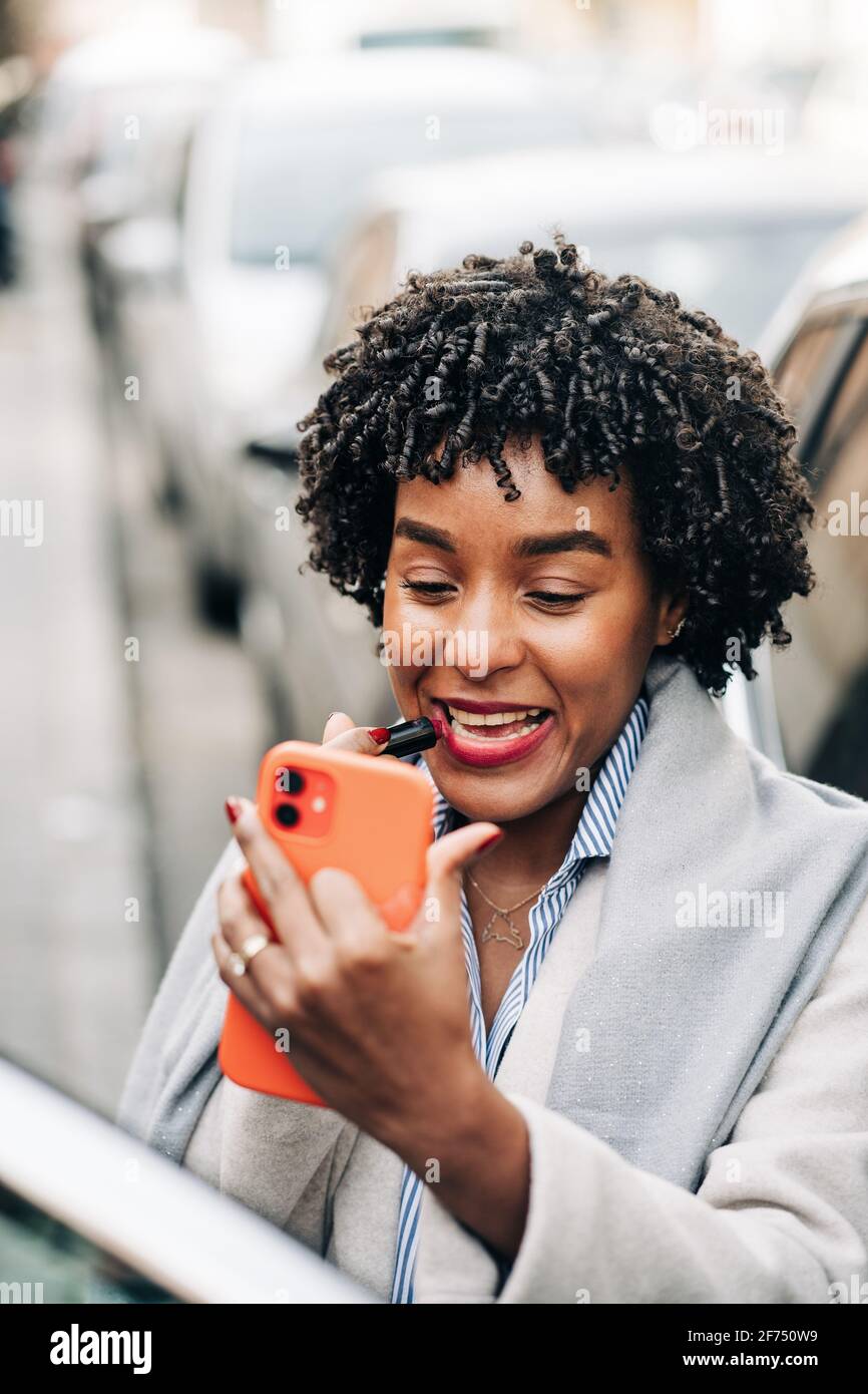High Angle Of Smiling African American Female With Curly Hairstyle