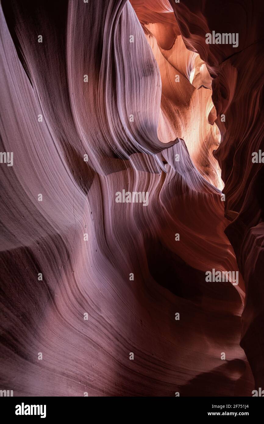 Picturesque landscape of narrow and deep slot canyon illuminated by ...