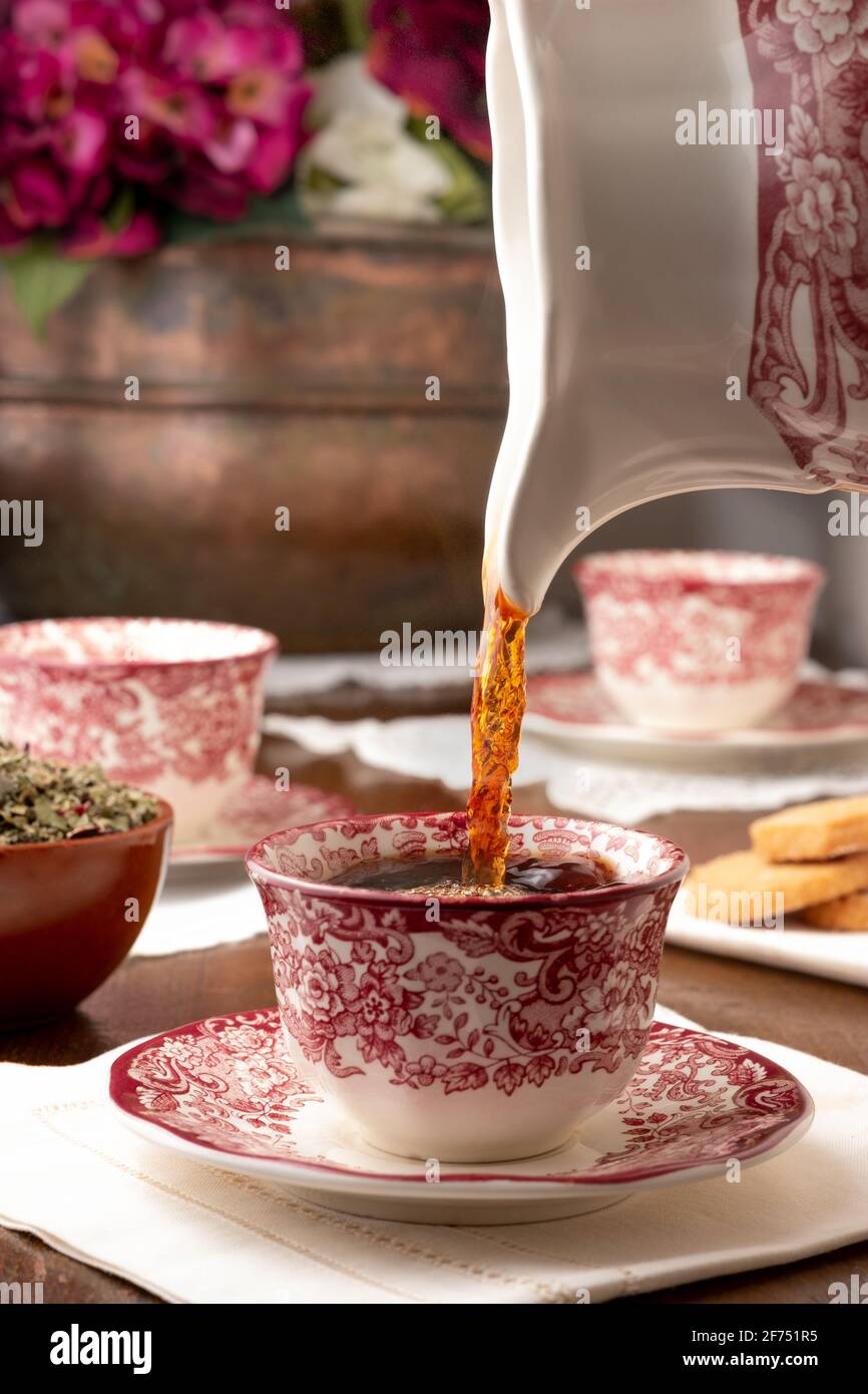 Hot tea poured teacup serve hi-res stock photography and images - Alamy