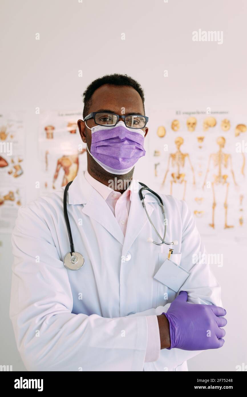 African American professional doctor with stethoscope in uniform and ...