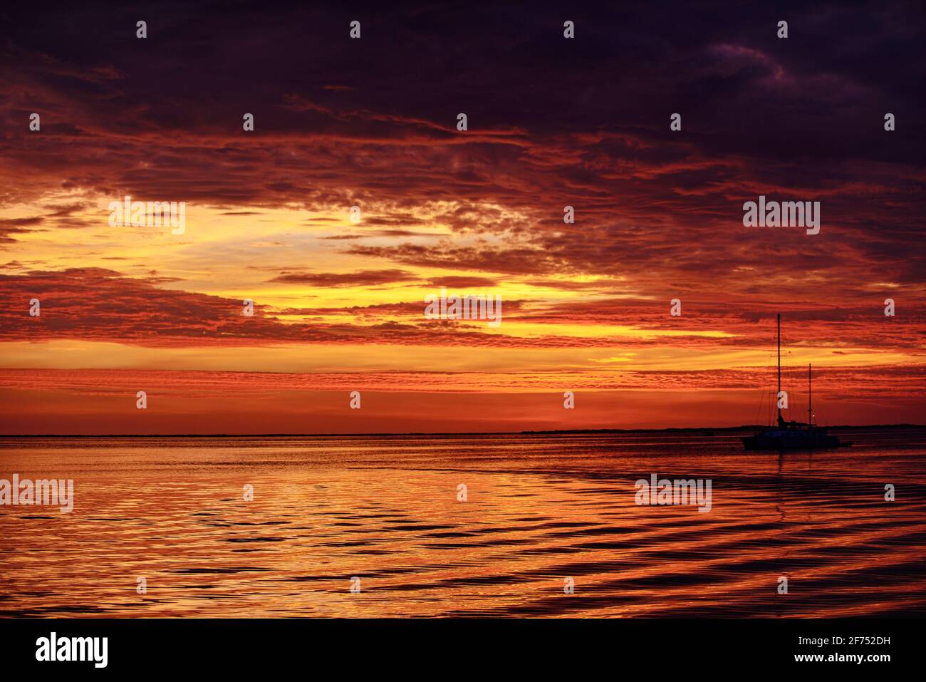Boat on the sea. Sailboats at sunset. Ocean yacht sailing on water ...