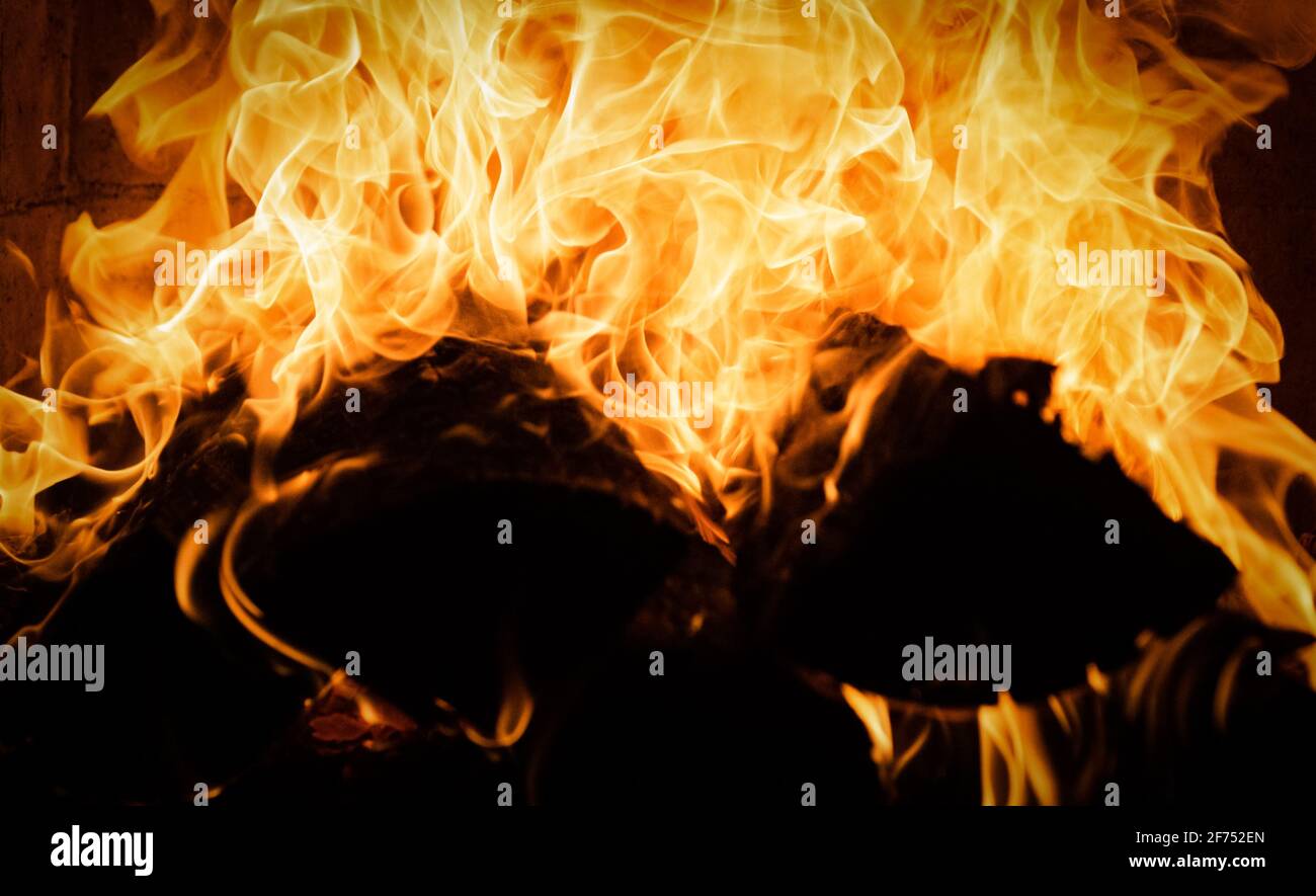 Burning wood. Cozy fire. Christmas fireplace. Fire texture. Flame ...