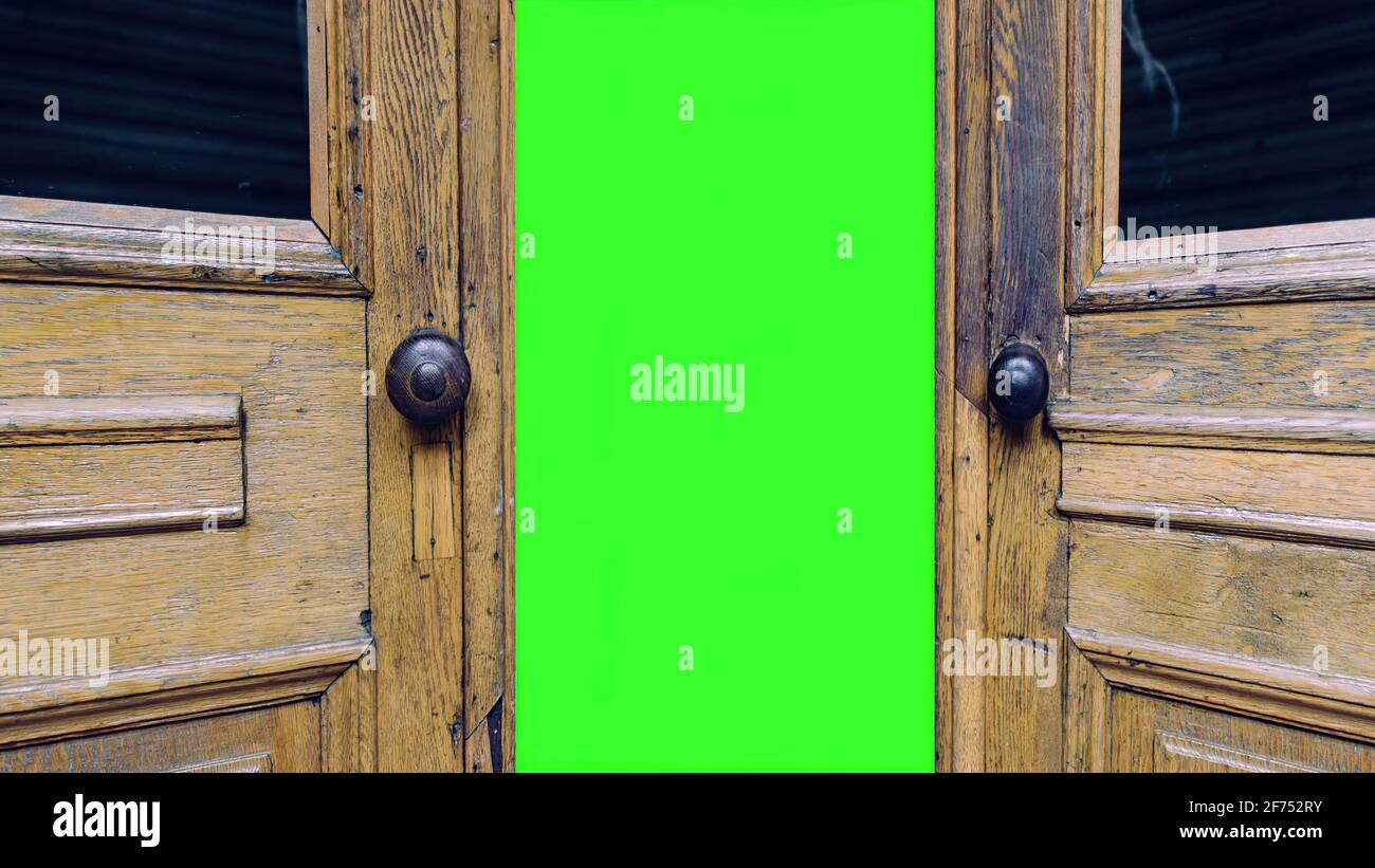 wooden door on green screen Stock Photo - Alamy