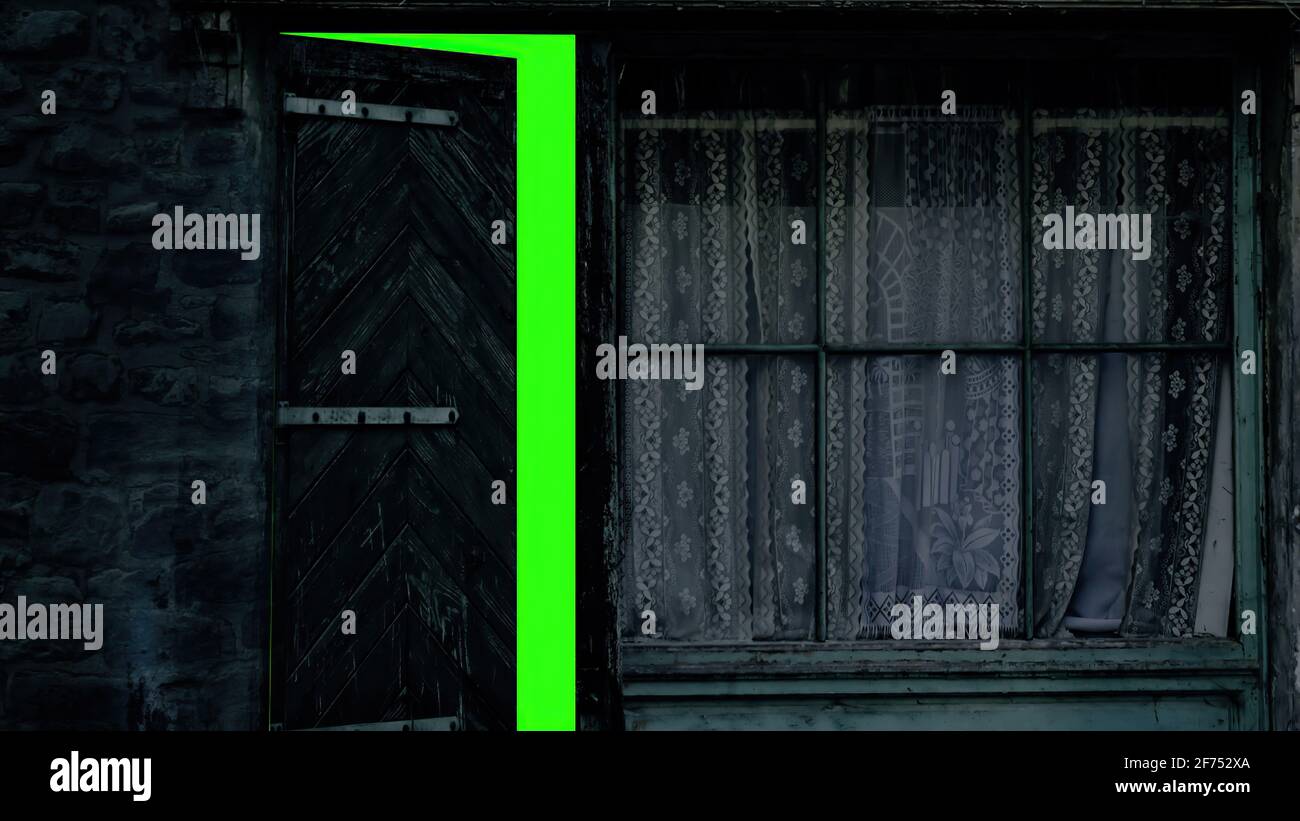 wooden door opening to green screen Stock Photo - Alamy