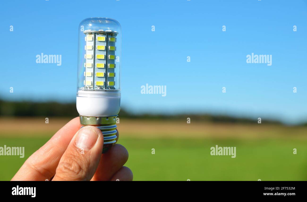 Hand holding led light hi-res stock photography and images - Alamy