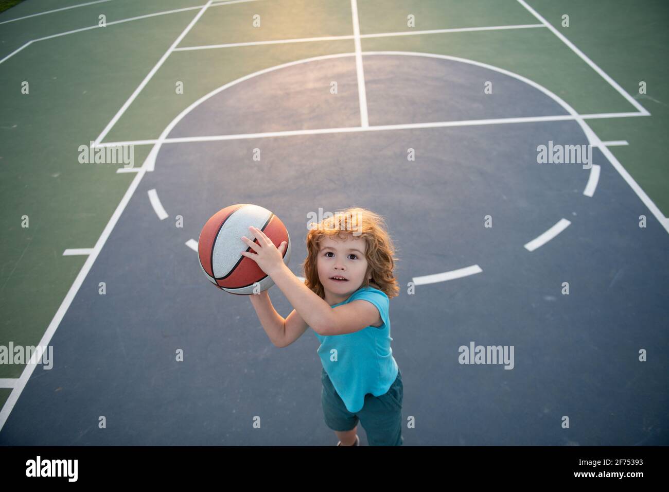 Child Shooting Basketball