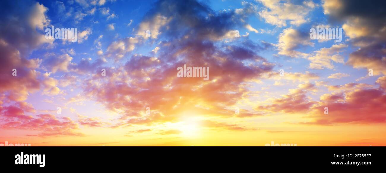 Dramatic colorful sky with clouds at sunset. Panoramic nature ...