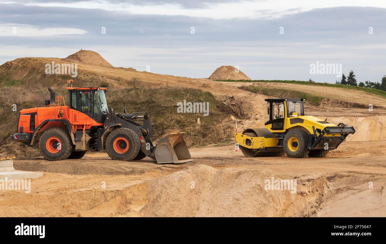 Construction machinery on a construction site Stock Photo - Alamy