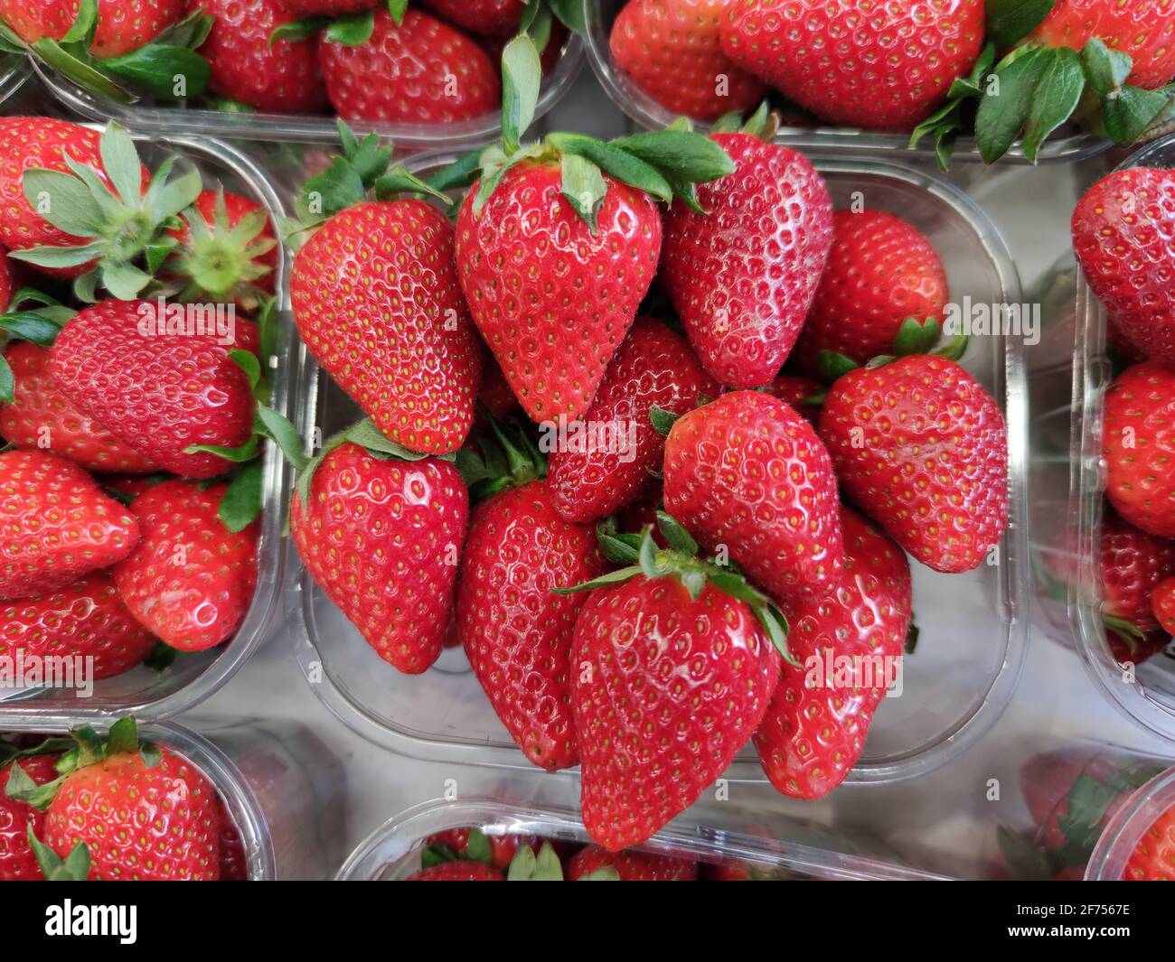 fresh strawberries at fruit market detail Stock Photo - Alamy