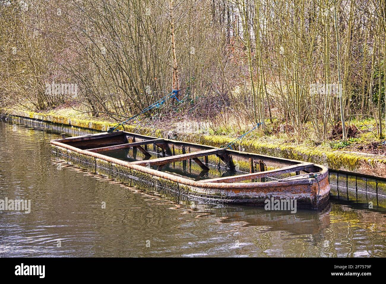Sinking old boat Stock Photo - Alamy