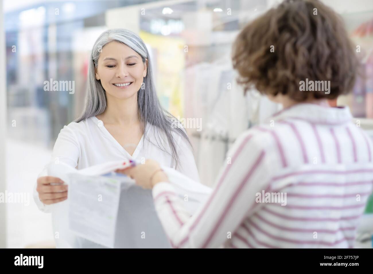 Dry cleaner customer hi-res stock photography and images - Alamy
