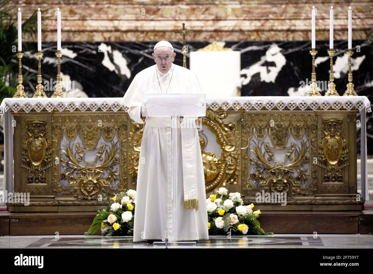 Pope Francis celebrating Easter Mass at St. Peter's Basilica in The ...