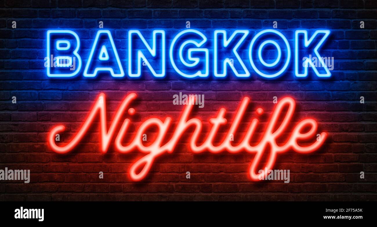 Neon sign on a brick wall - Bangkok Nightlife Stock Photo - Alamy