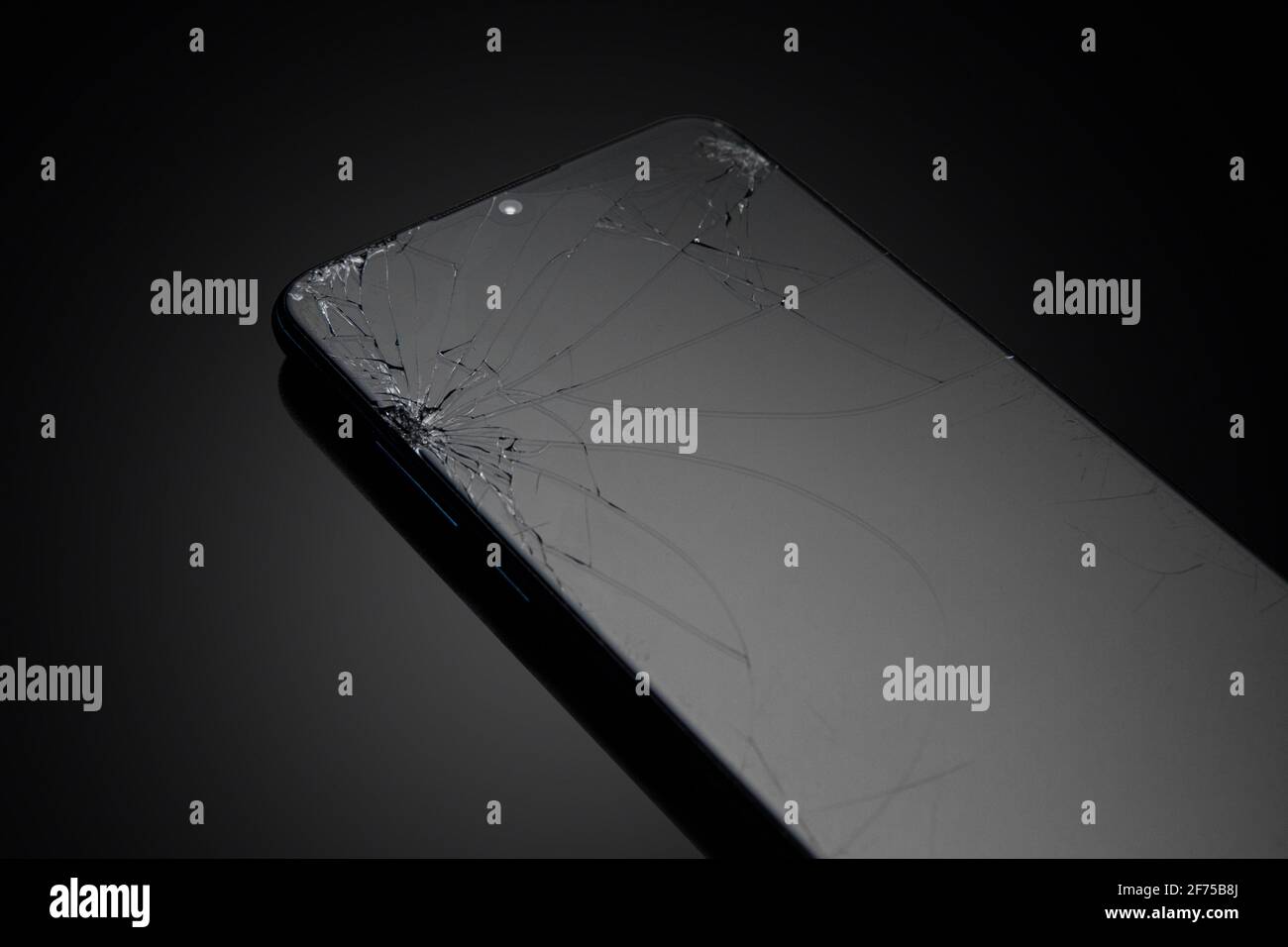 Broken screen glass of mobile smartphone on black background Stock ...