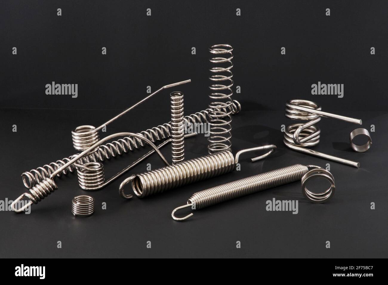 Metal springs in different sizes Stock Photo - Alamy