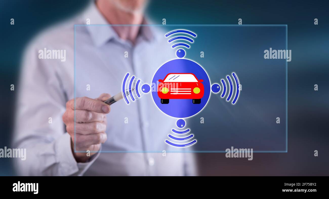 Man touching a smart car concept on a touch screen with a pen Stock ...