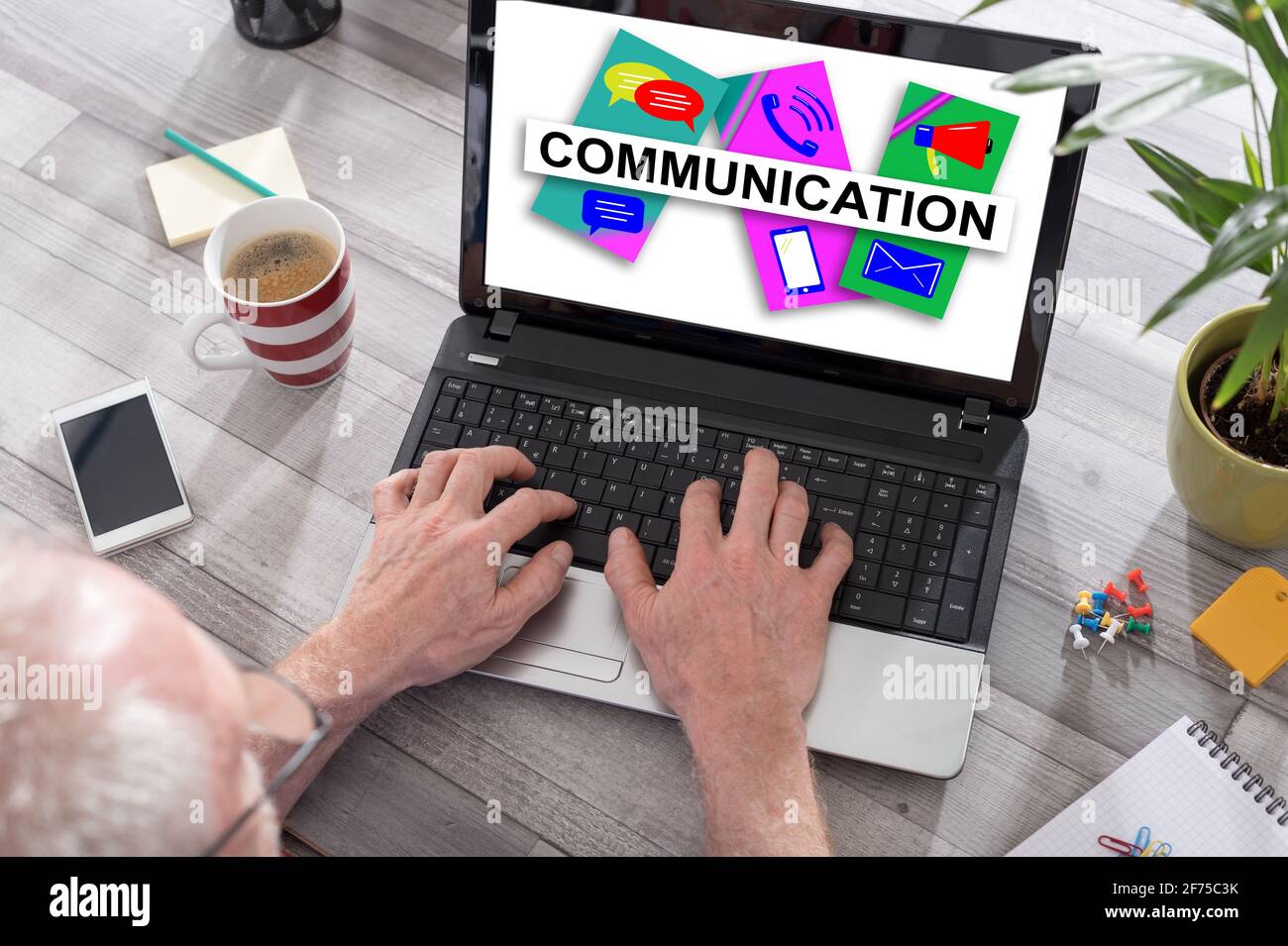 Communication concept shown on a laptop used by a man Stock Photo - Alamy