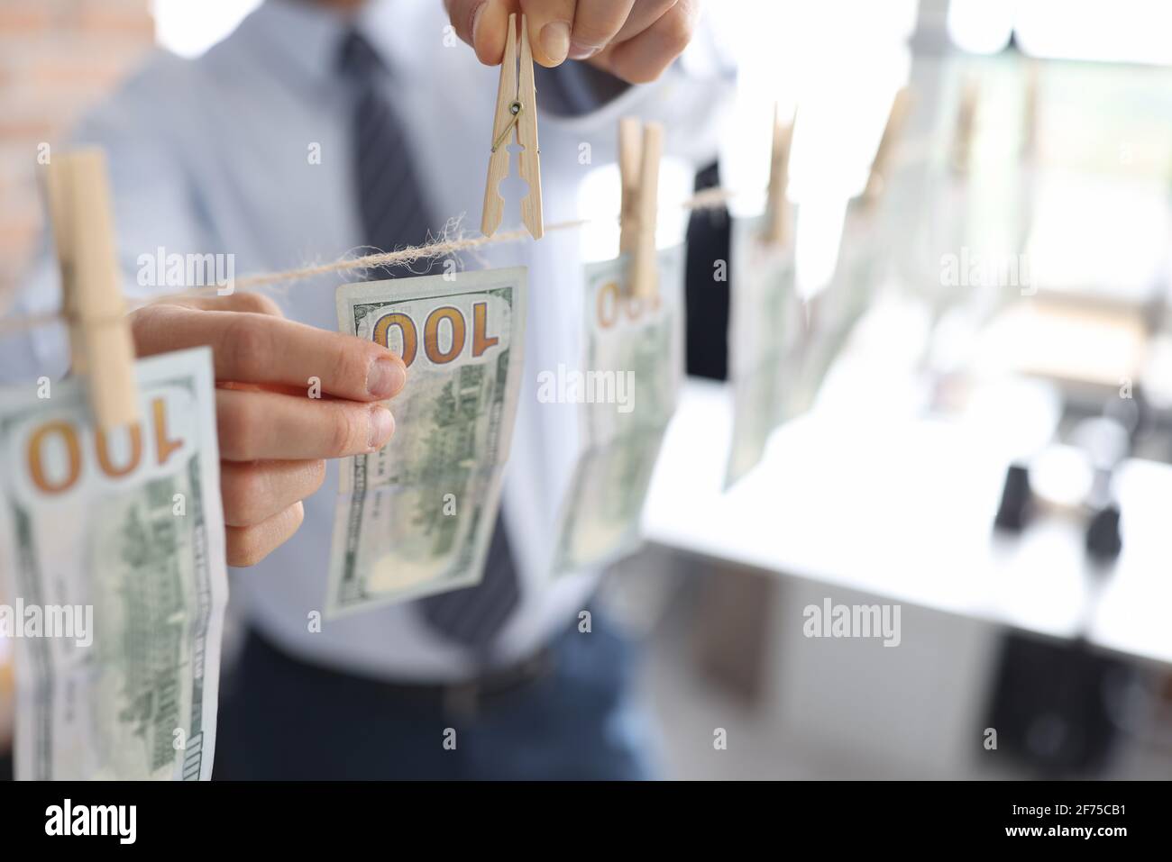 Businessman hanging rope hi-res stock photography and images - Alamy