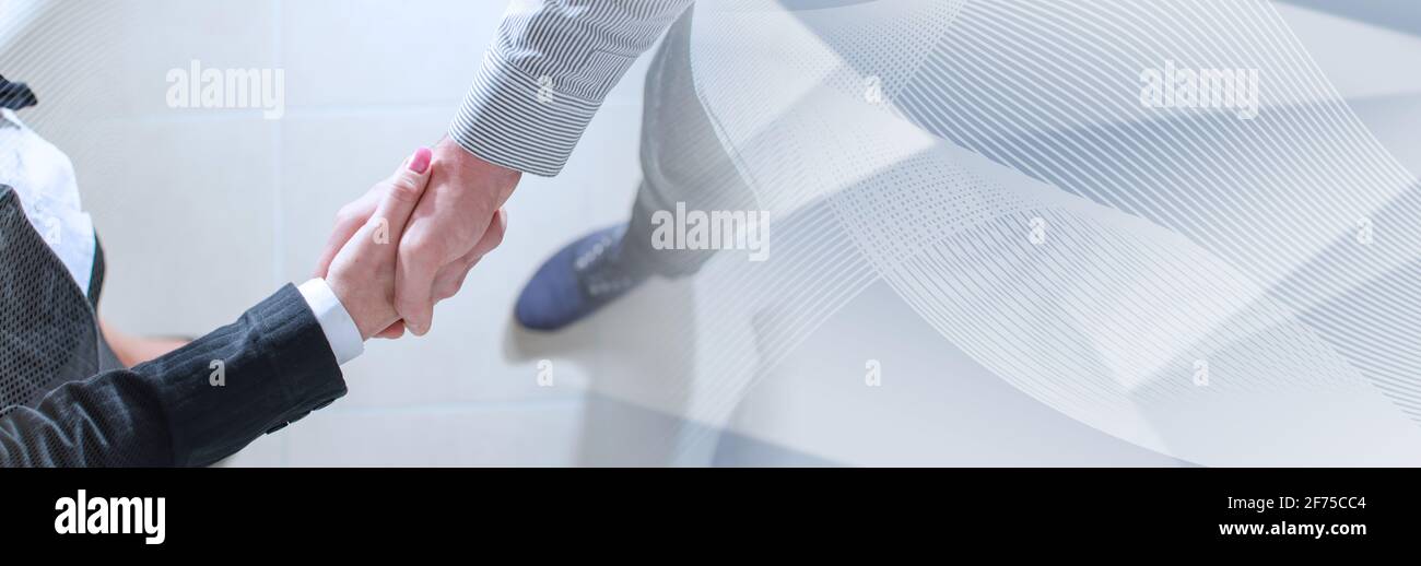 Top view of business handshake; panoramic banner Stock Photo - Alamy