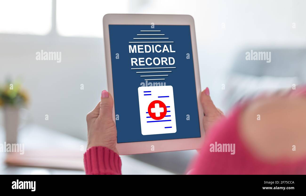Tablet screen displaying a medical record concept Stock Photo - Alamy
