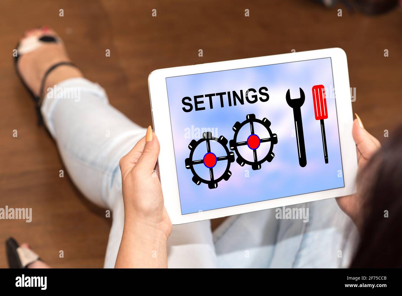 Tablet screen displaying a settings concept Stock Photo - Alamy
