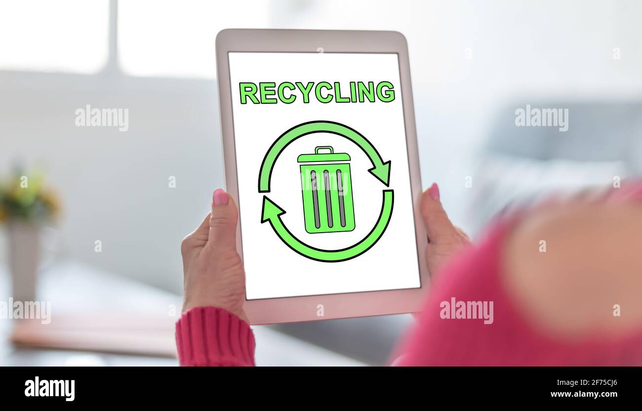 Tablet screen displaying a recycling concept Stock Photo - Alamy
