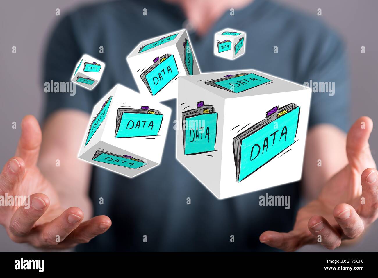 Data concept between hands of a man in background Stock Photo - Alamy