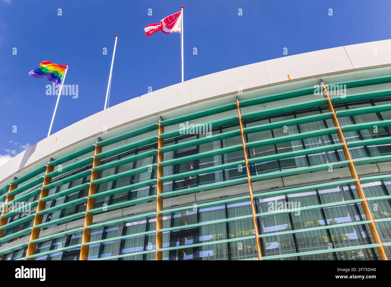 Flags on top of the modern town hall of Assen, Netherlands Stock Photo ...