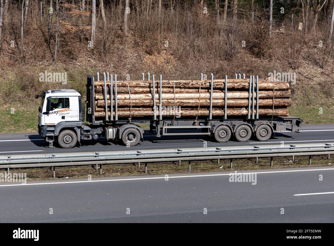 Logging truck on road hi-res stock photography and images - Alamy