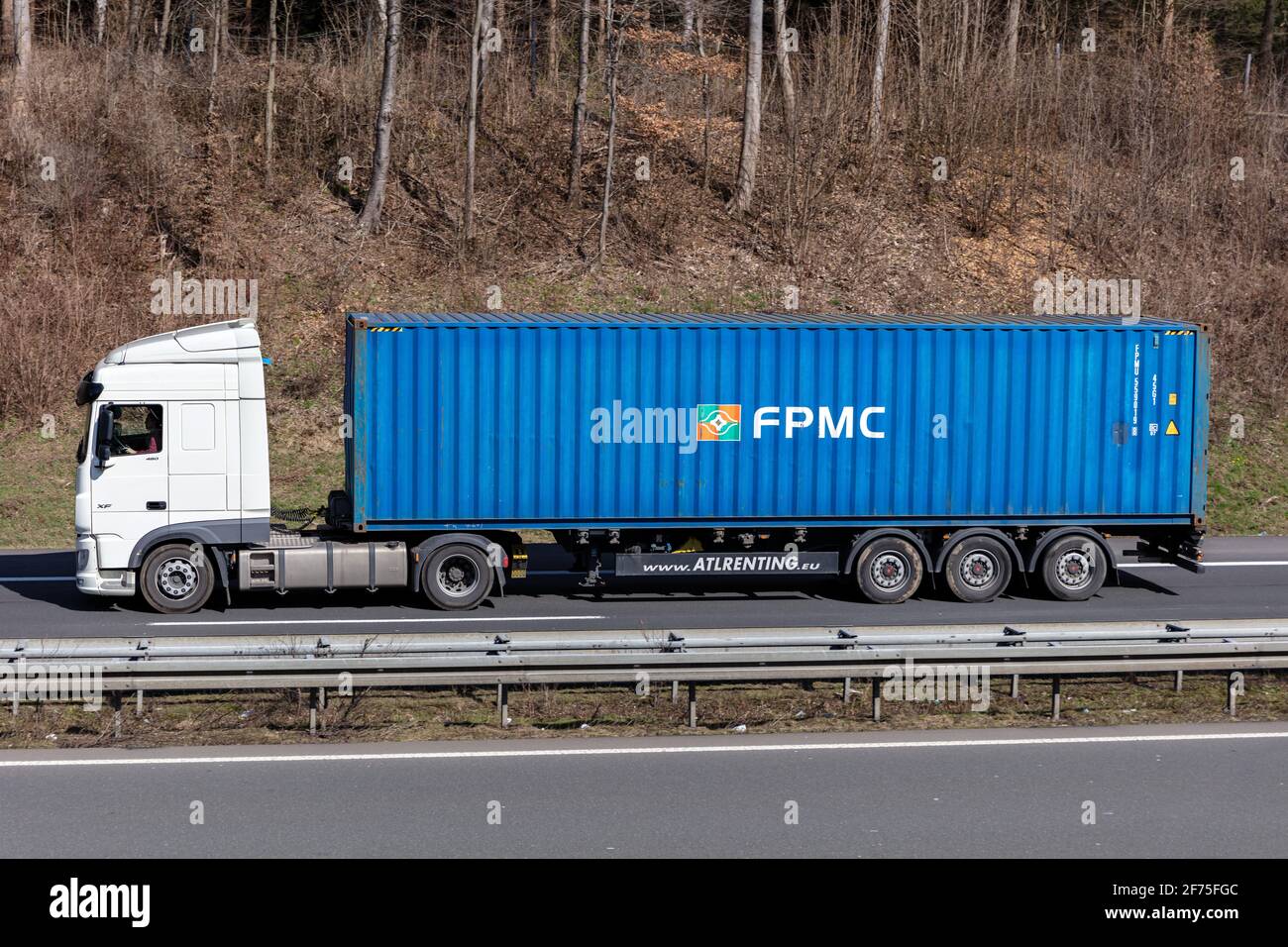 DAF XF truck with FPMC container on motorway Stock Photo - Alamy
