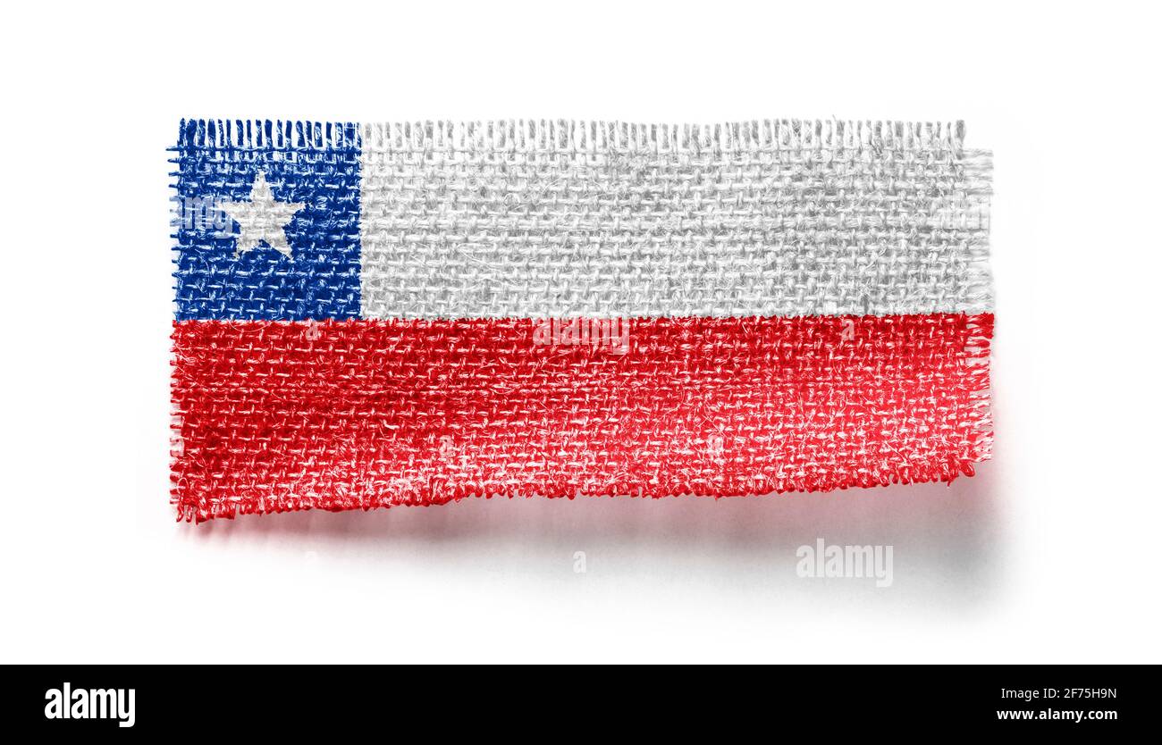 Chile flag on a piece of cloth on a white background Stock Photo - Alamy