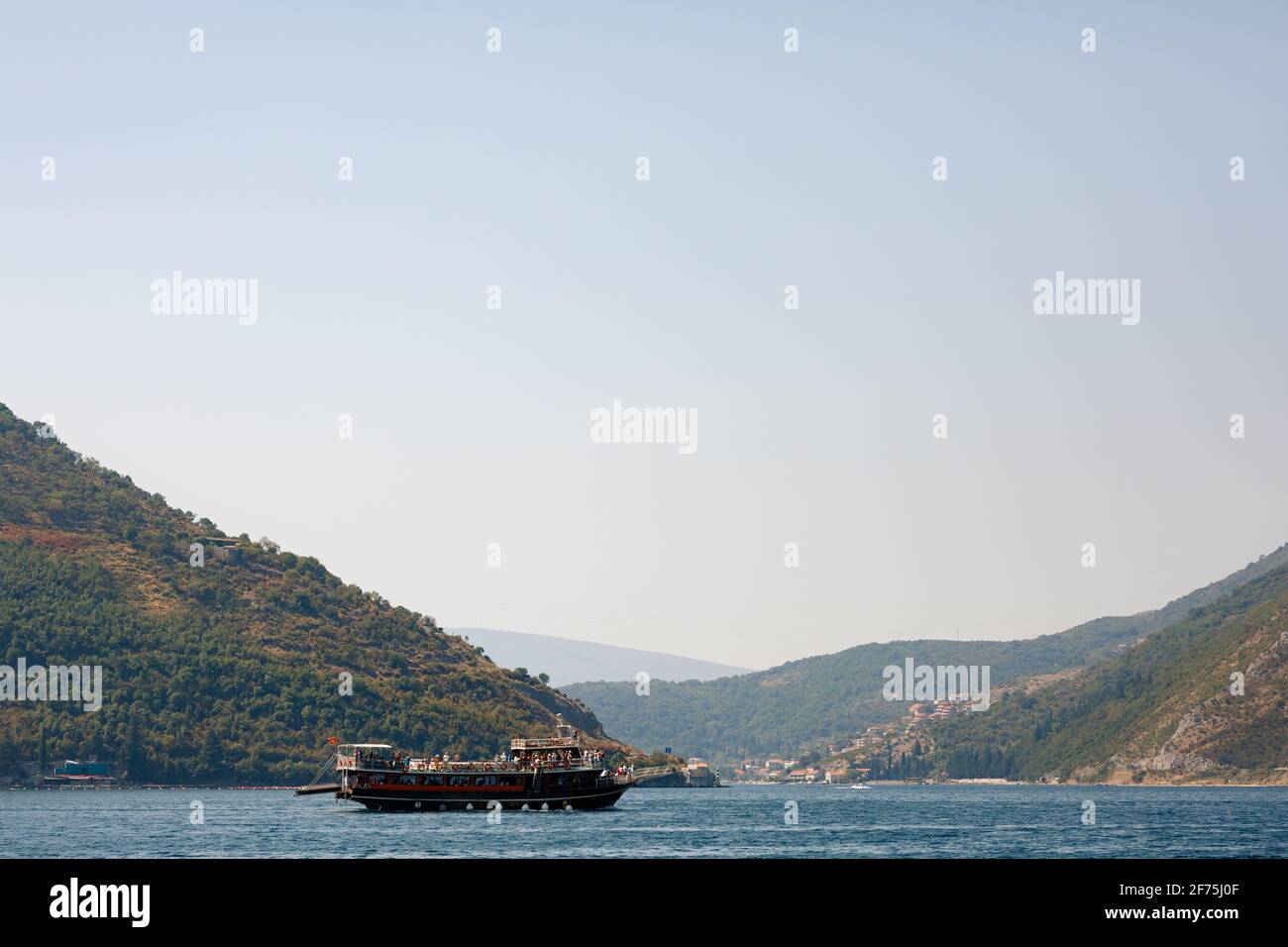 Double-deck ship with passengers on board. Boat trip on the Bay of ...