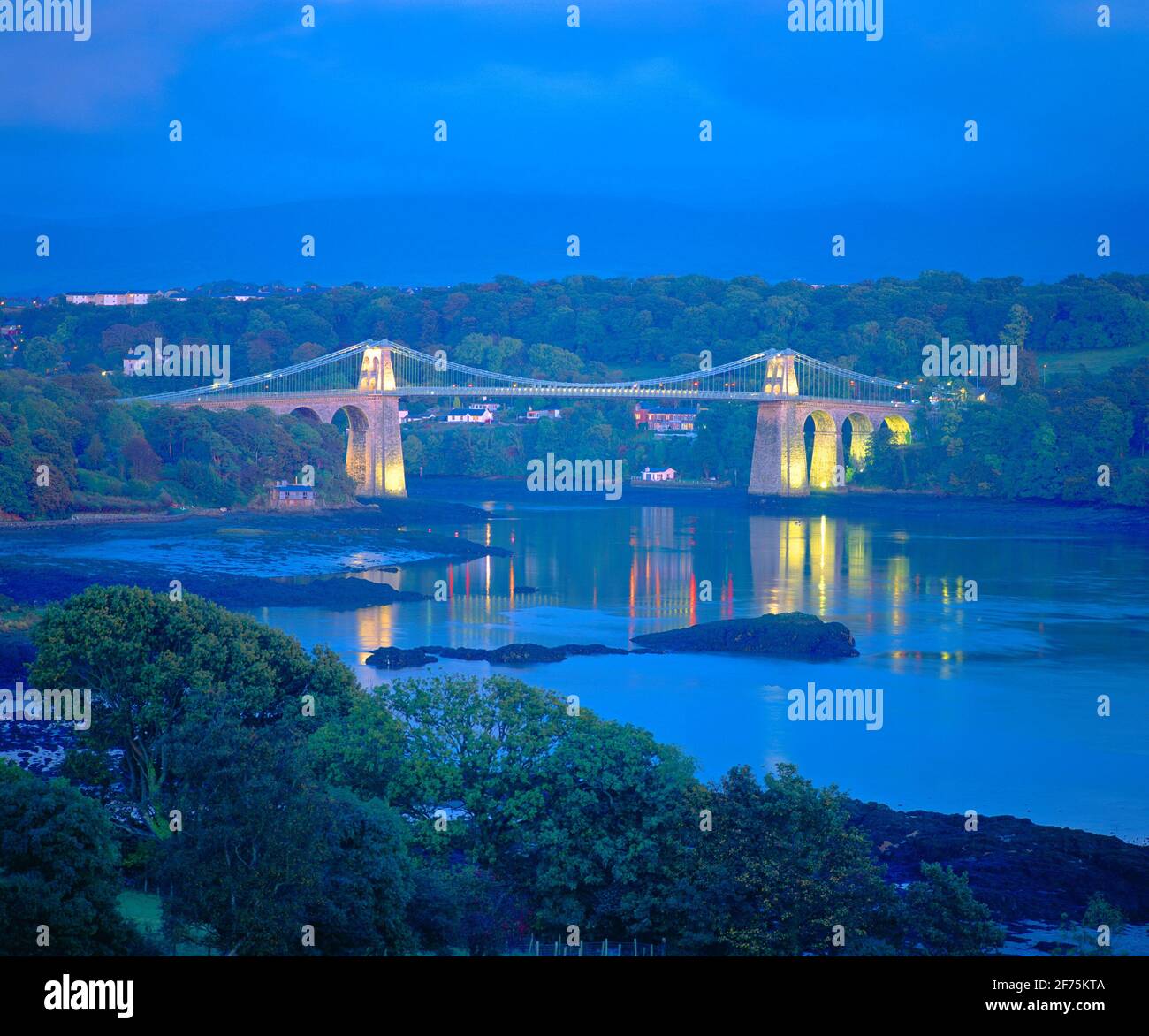 UK, Wales, Menai Bridge over Menai Strait, autumn, illuminated Stock ...